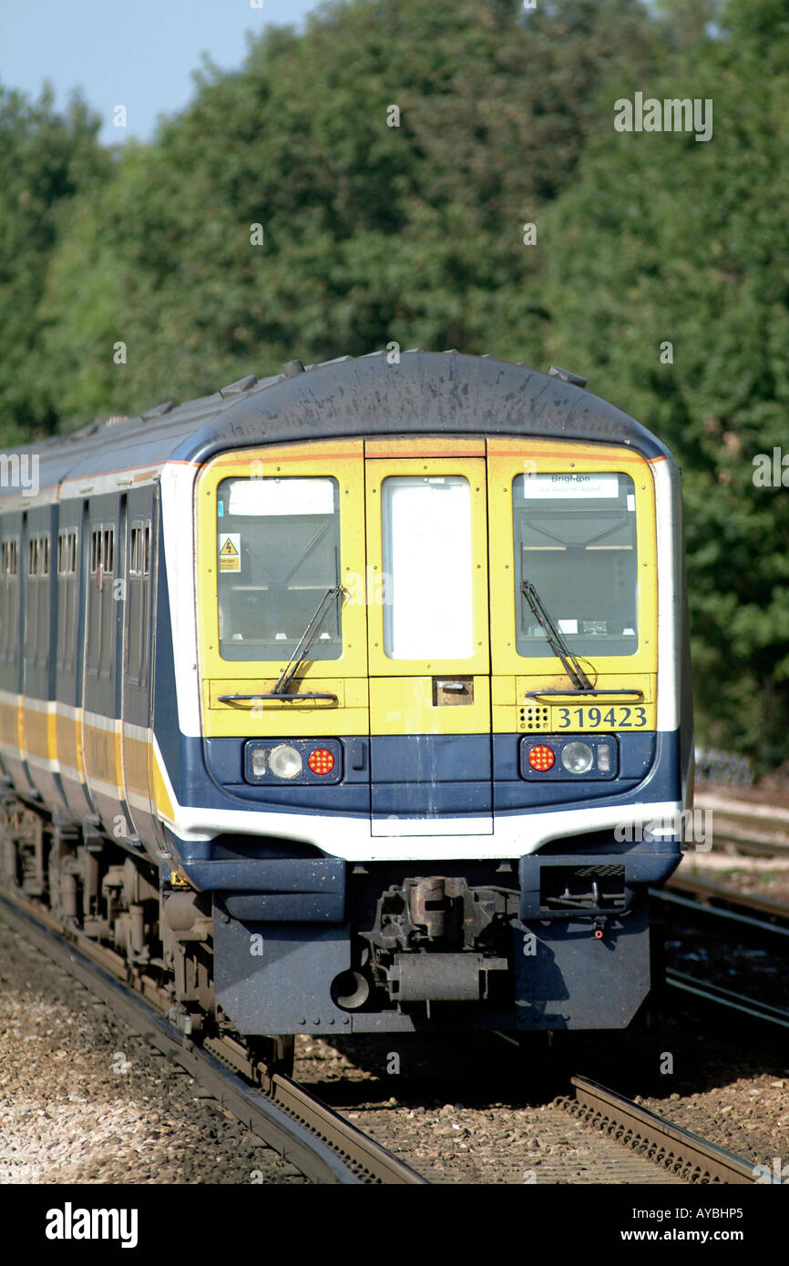 Thameslink class 319 train travelling through the british countryside ...