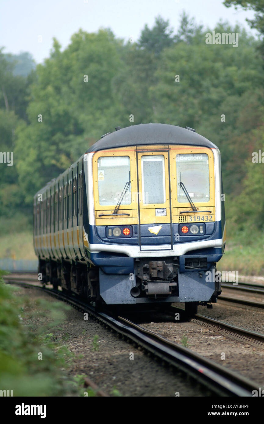 Thameslink class 319 train travelling through the british countryside ...