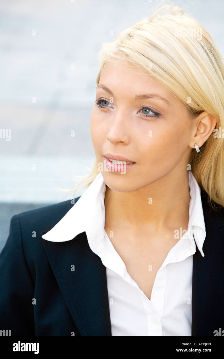 Young businesswoman with pensive expression Stock Photo - Alamy
