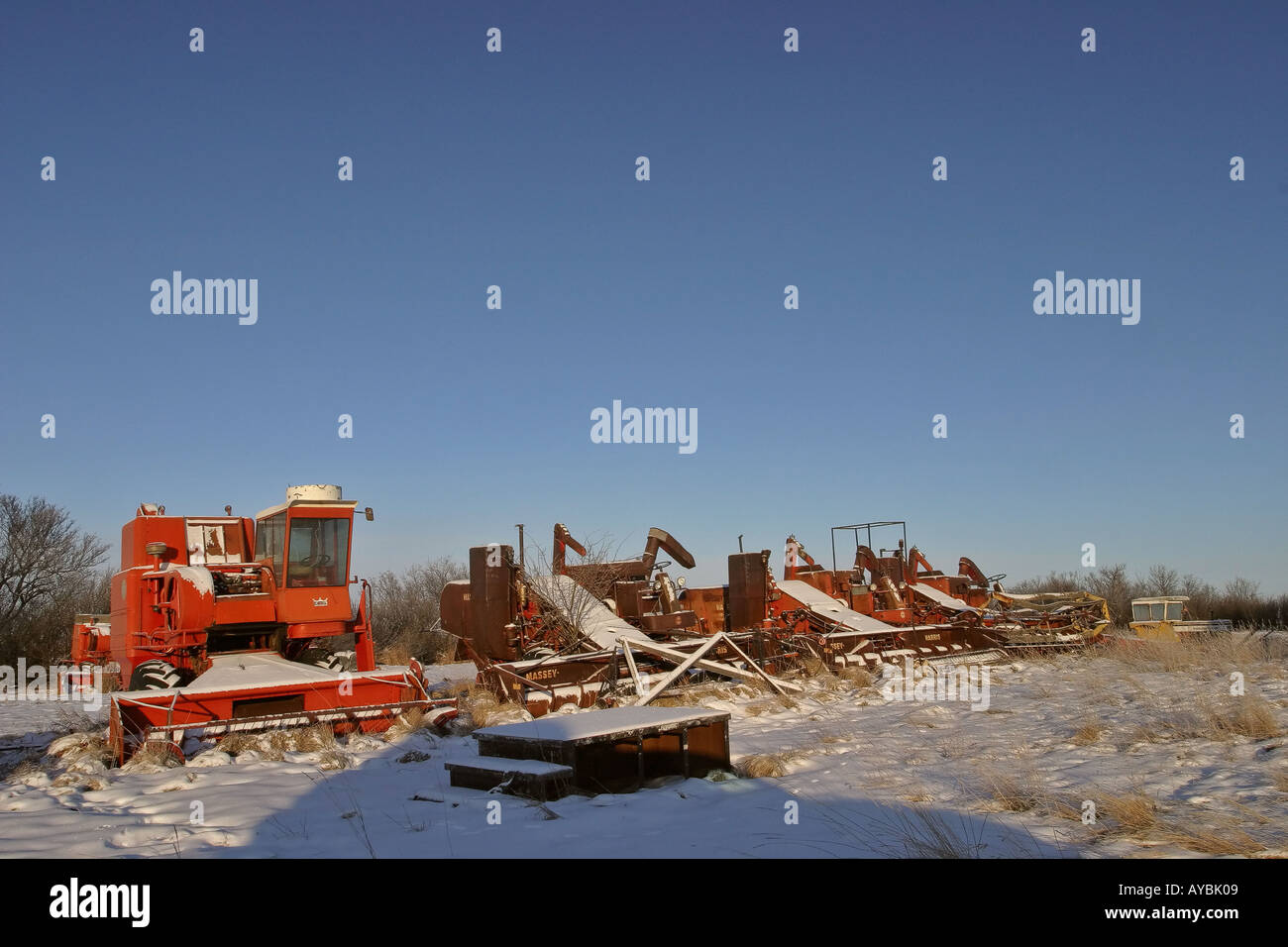 Old combines in a farm yard in scenic Saskatchewan Stock Photo - Alamy