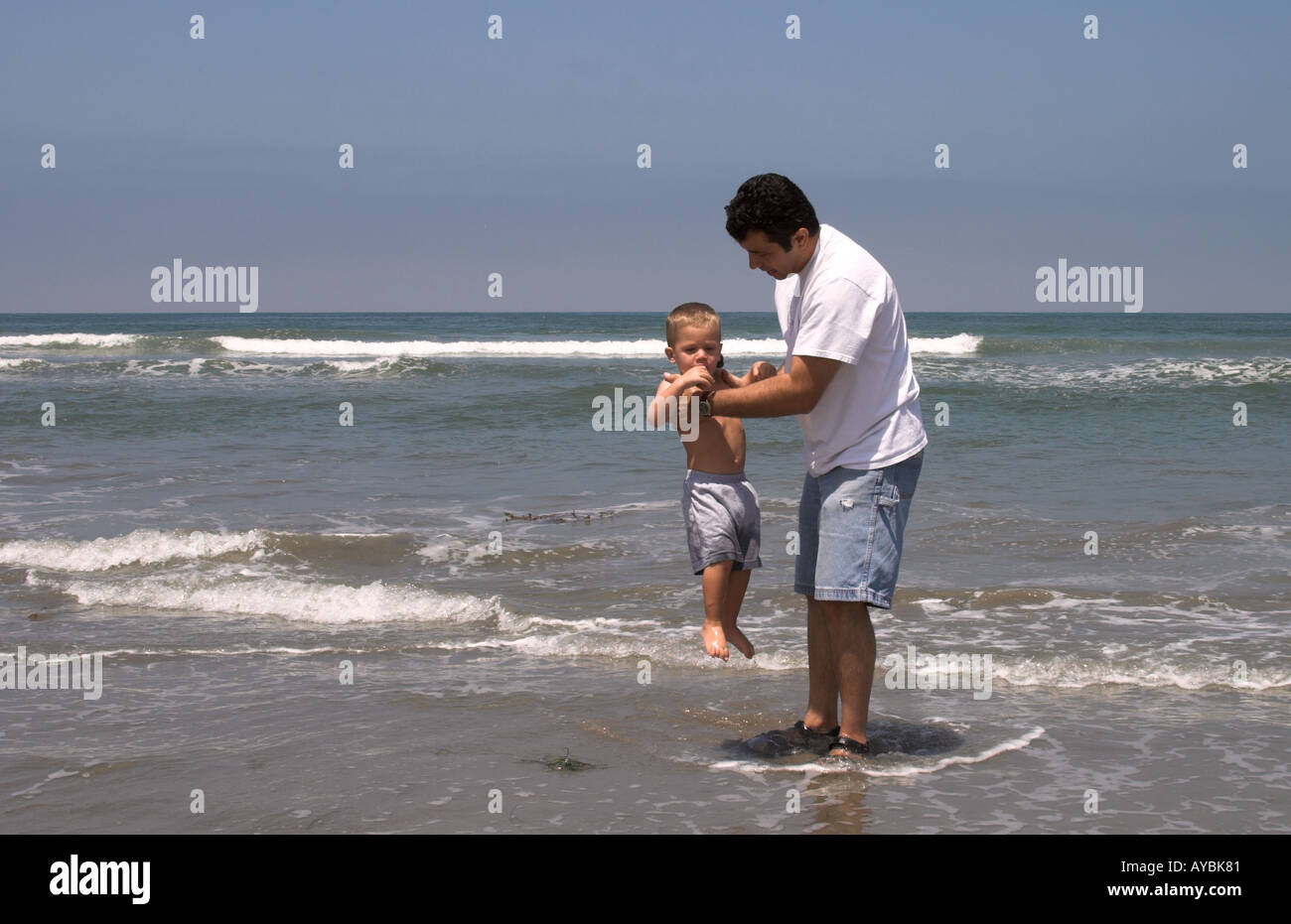 On the beach with daddy 2 Stock Photo - Alamy