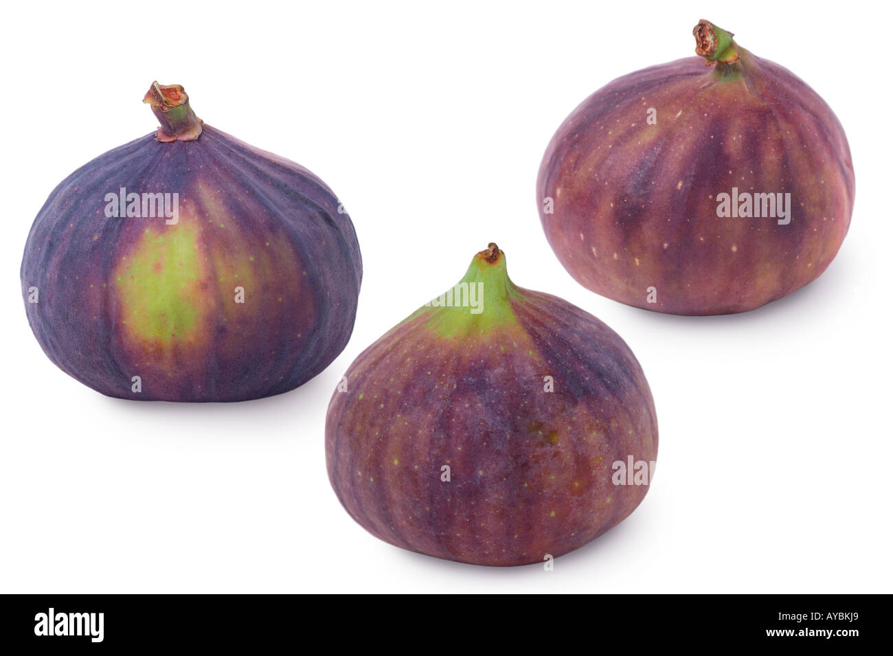 Three whole figs on a white background Stock Photo - Alamy