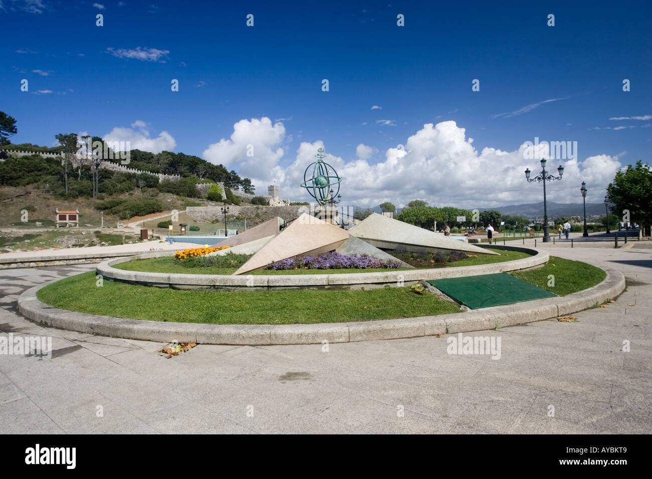 Floral roundabout with bronze globe and compass Baiona Galicia Spain ...