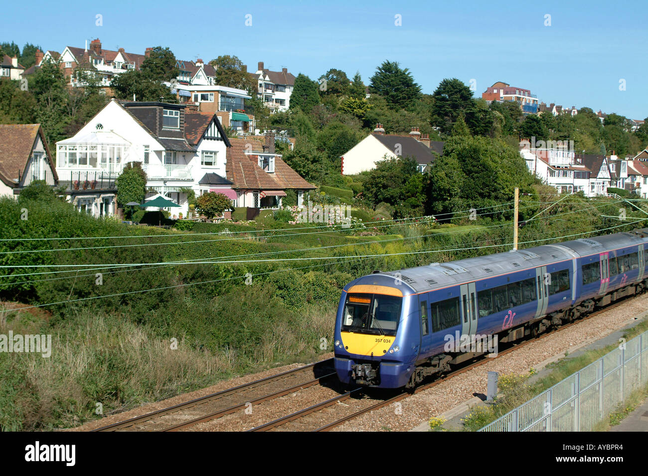 C2C train at speed on the Southend on Sea to London train service ...