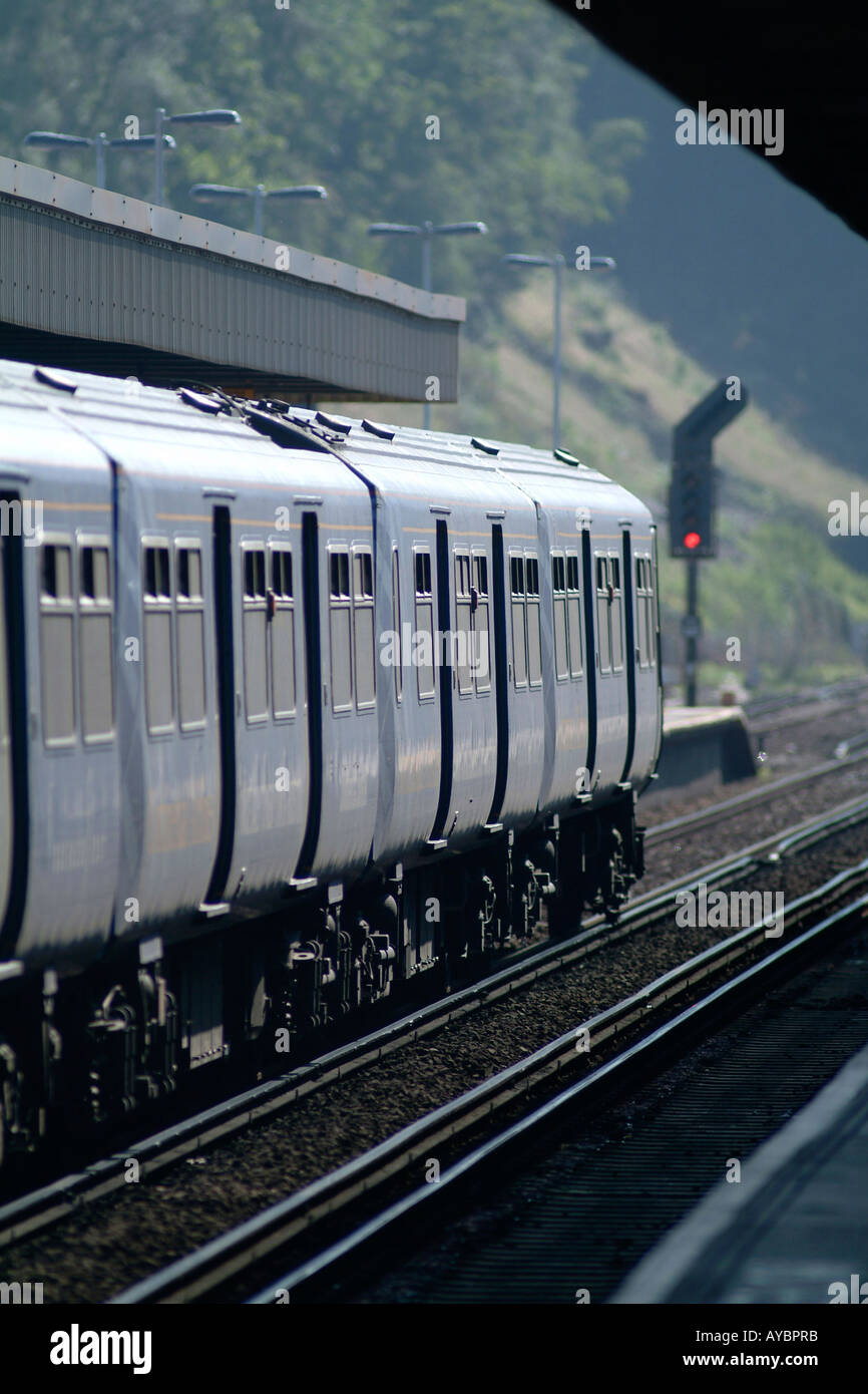 Thameslink class 319 train passing through a railway station in the uk ...
