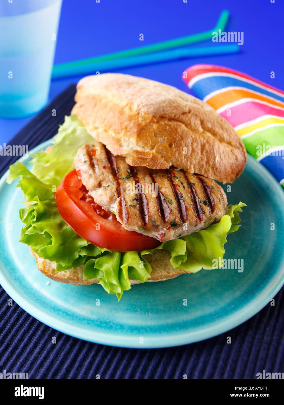 A single chicken burger Stock Photo - Alamy