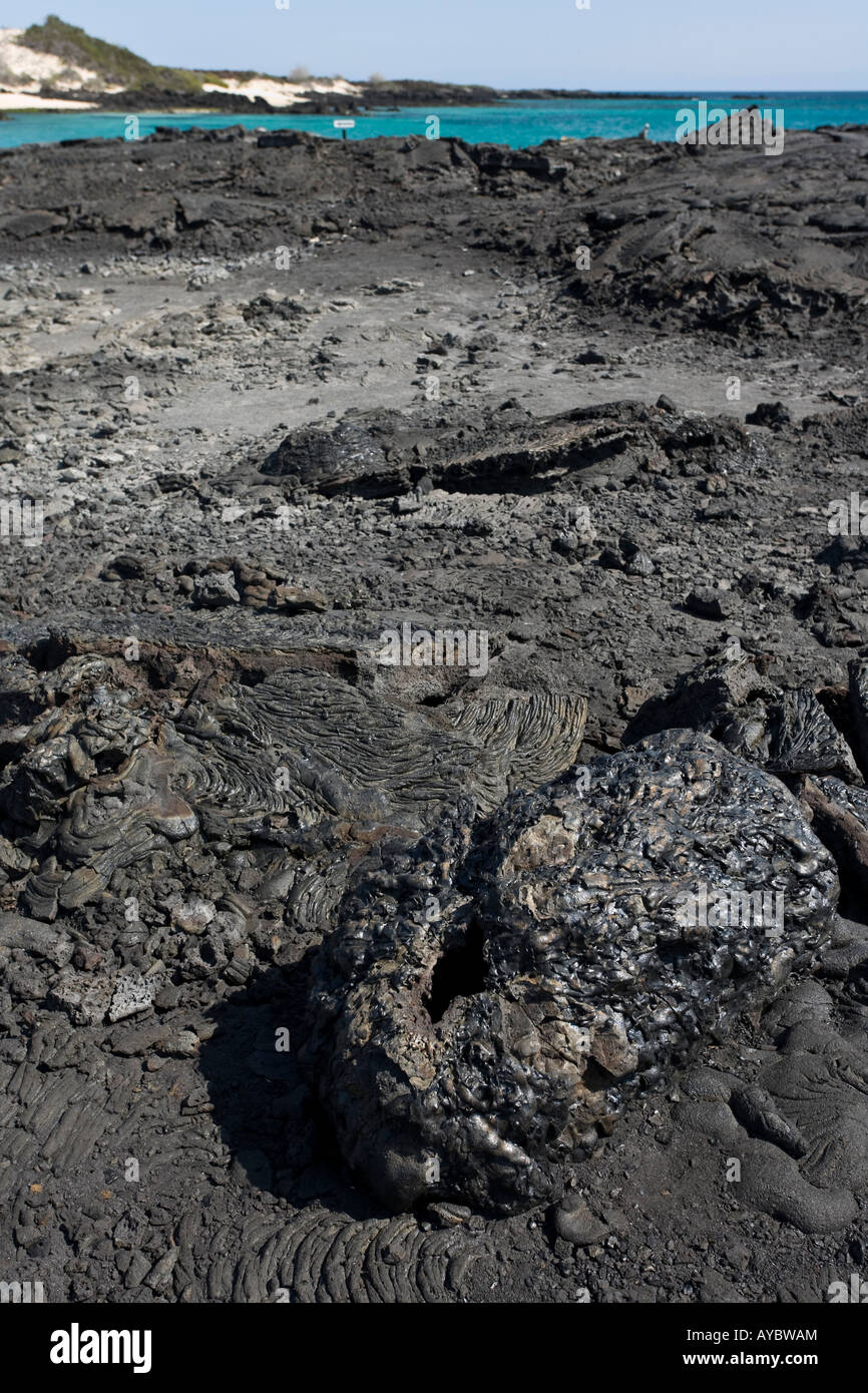Shiny black basaltic lava near the beach on Bartolome Stock Photo - Alamy