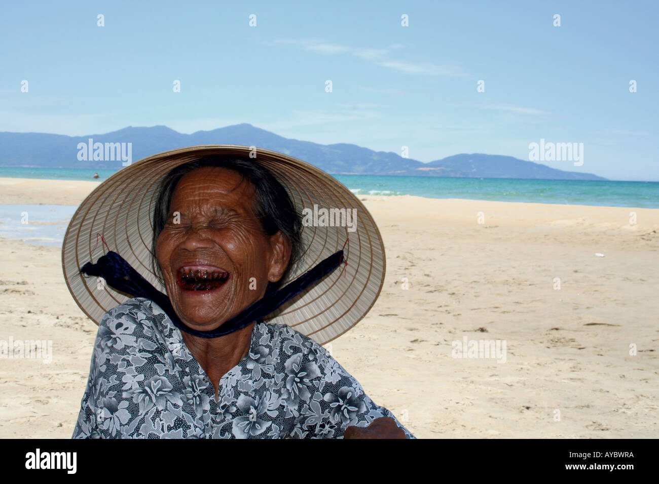 Elderly vietnamese woman laughing hi-res stock photography and images ...