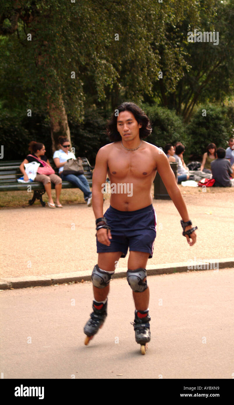 Man rollerblading in Hyde Park London Stock Photo - Alamy