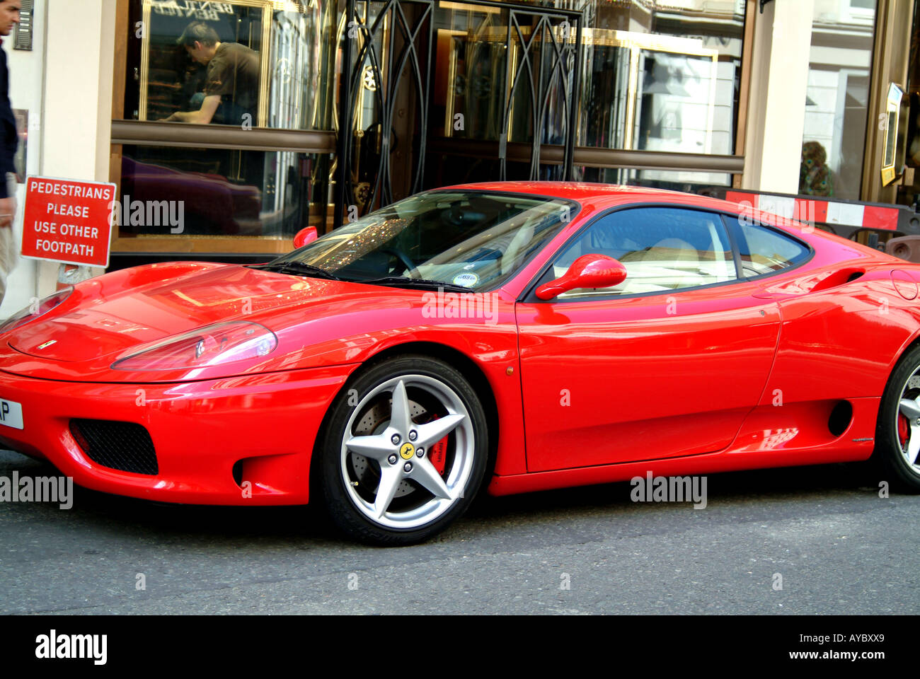 Red Ferrari in New Bond Street London Stock Photo - Alamy