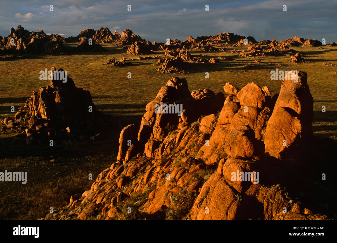 Mongolia, Dundgobi Province. Rock Towers rise out of the Steppe Stock ...