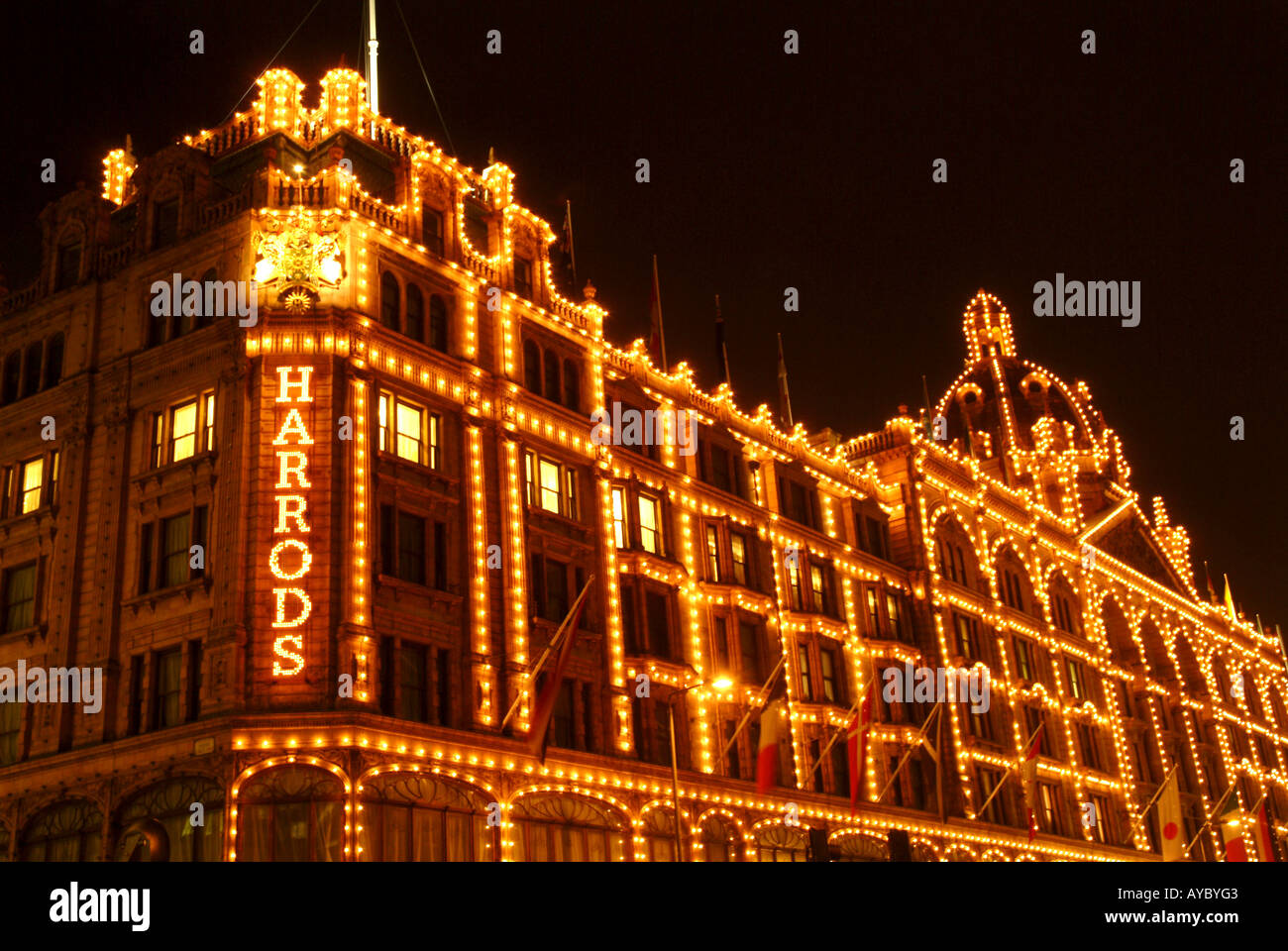 Harrods department store lit up at night Knightsbridge London Stock ...