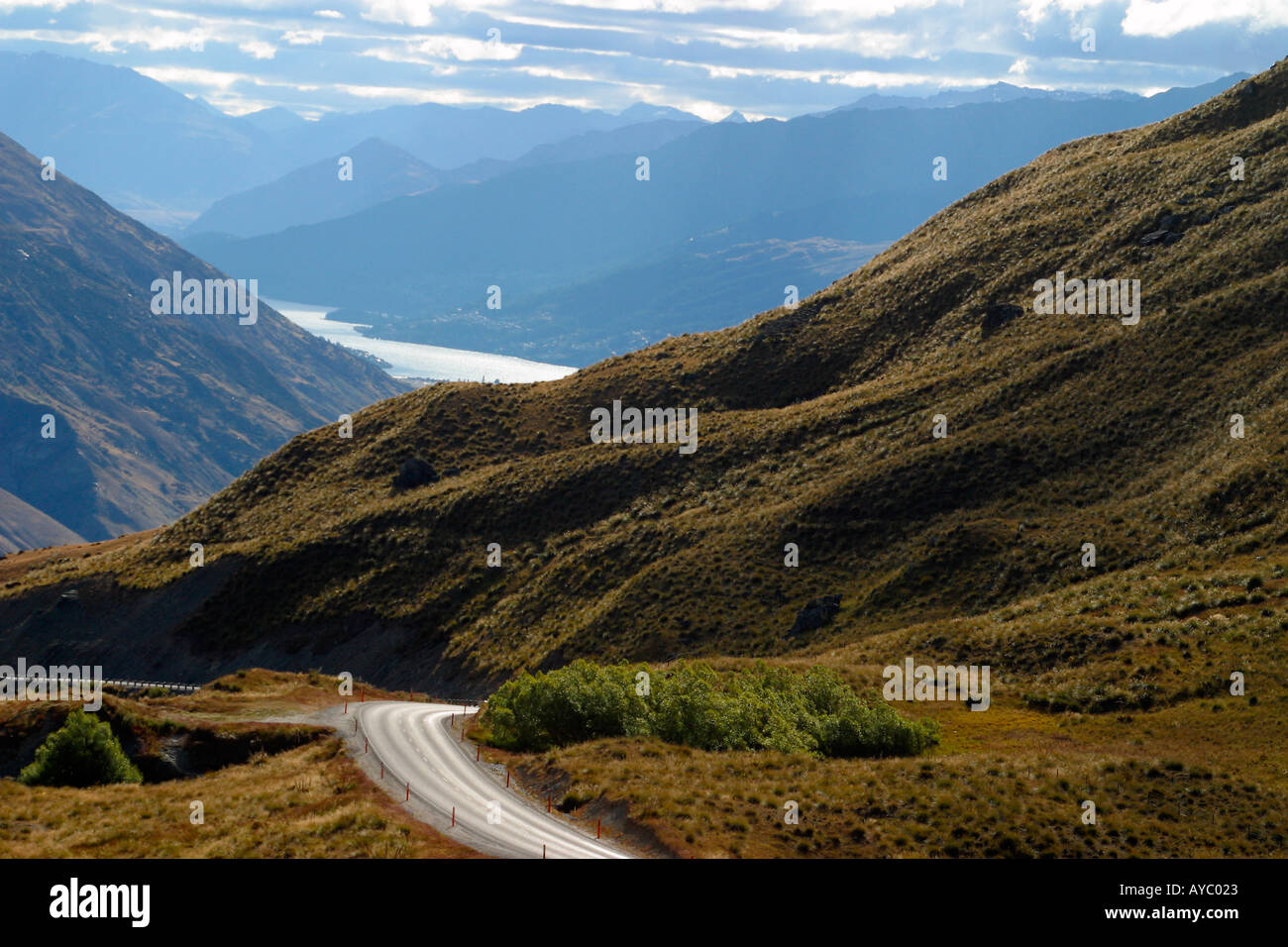 Road through hills in scenic Queenstown New Zealand Stock Photo - Alamy