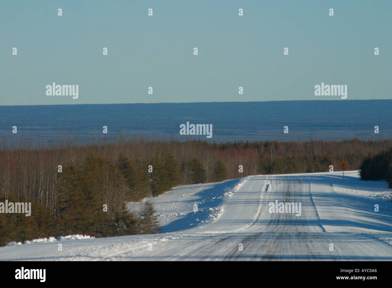 Snow covered road in scenic Northern Saskatchewan Canada Stock Photo ...