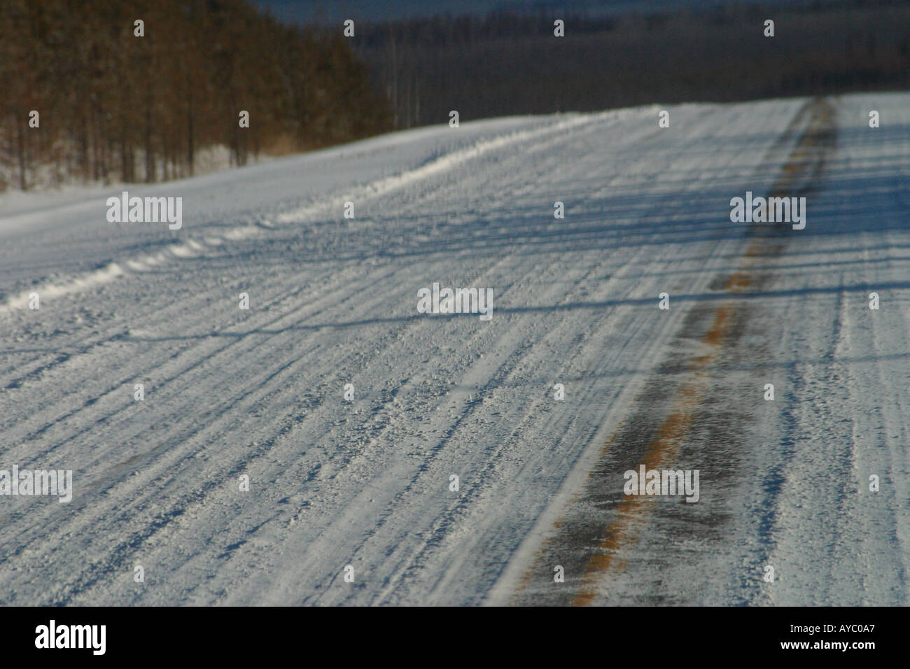 Snow covered road in scenic Northern Saskatchewan Canada Stock Photo ...
