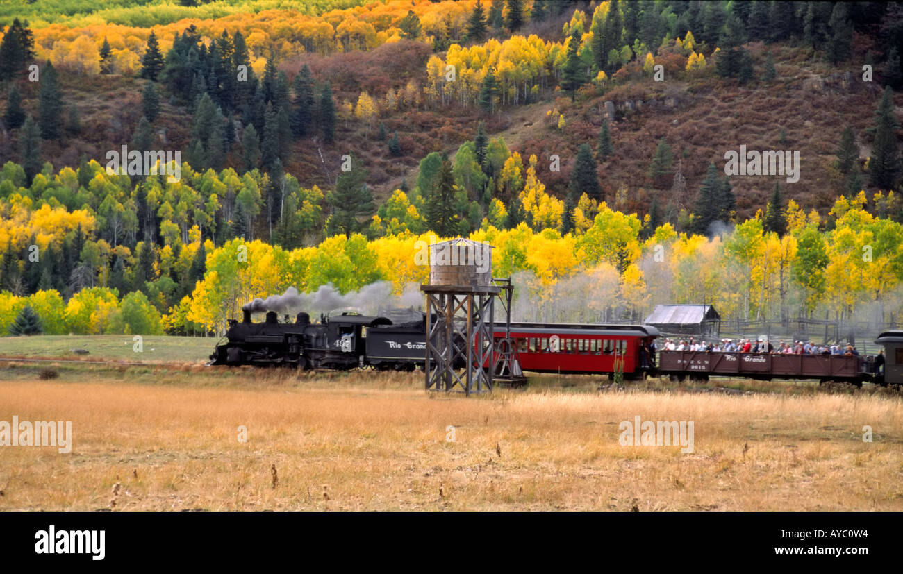 The Cumbres and Toltec train steams through the blazing fall colors of ...