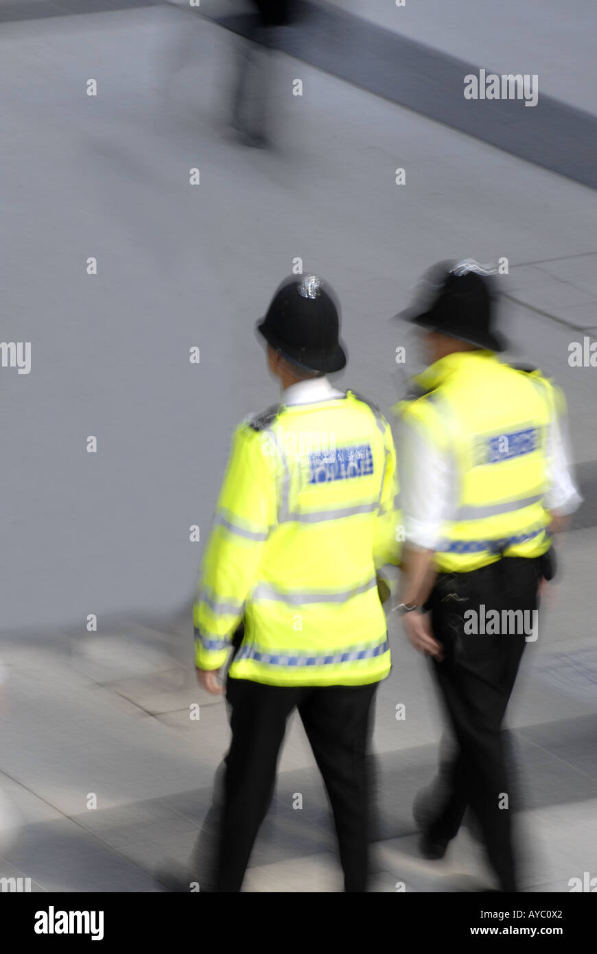 Policemen at a railway station image Stock Photo - Alamy
