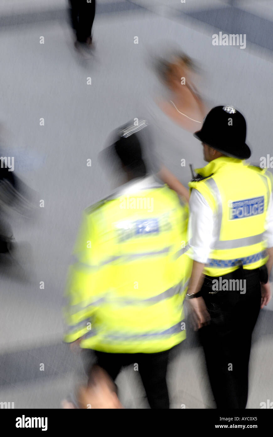 Policemen at a railway station image Stock Photo - Alamy