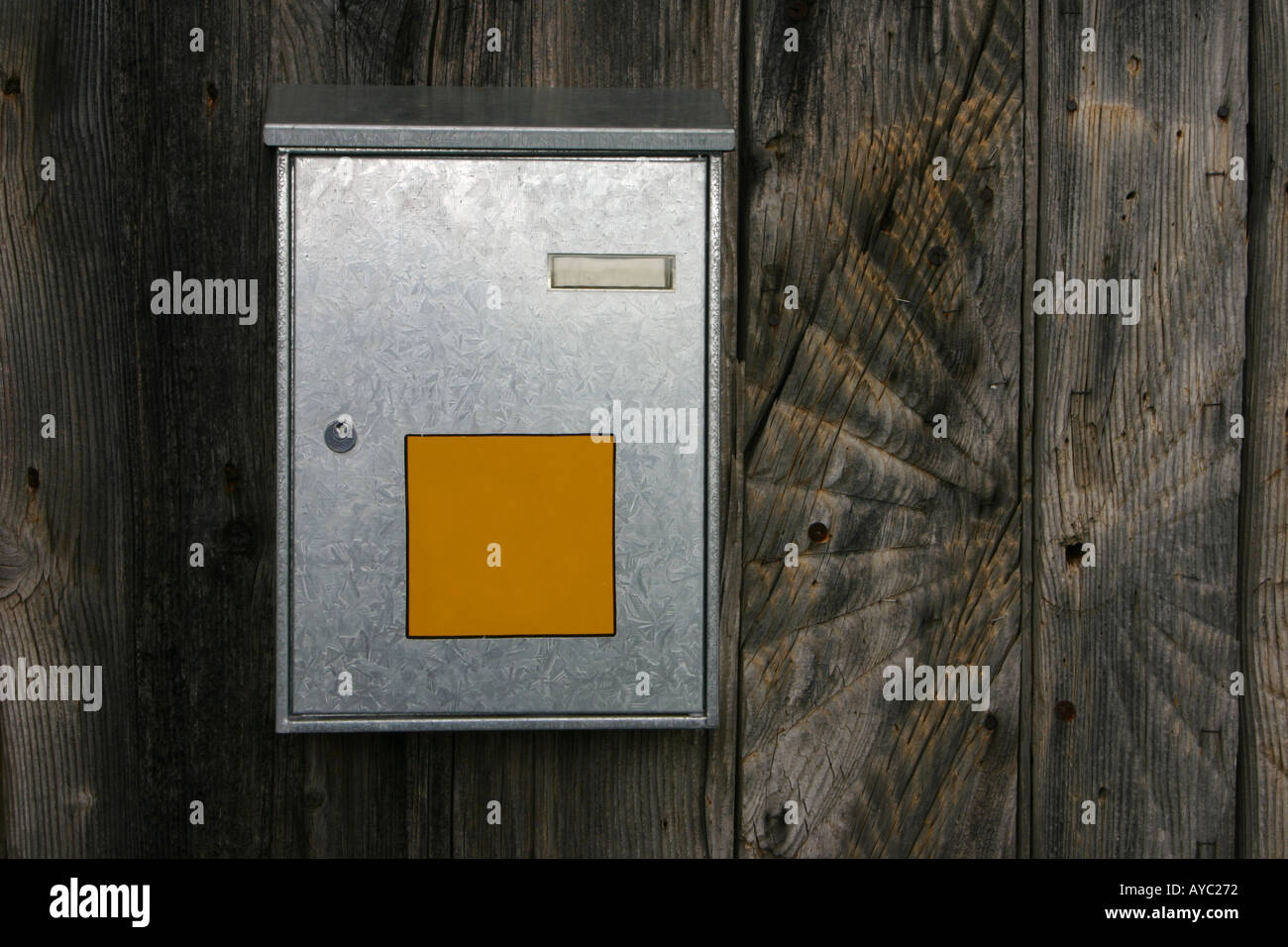Tin mailbox on wooden door blank name and postal service areas Stock ...