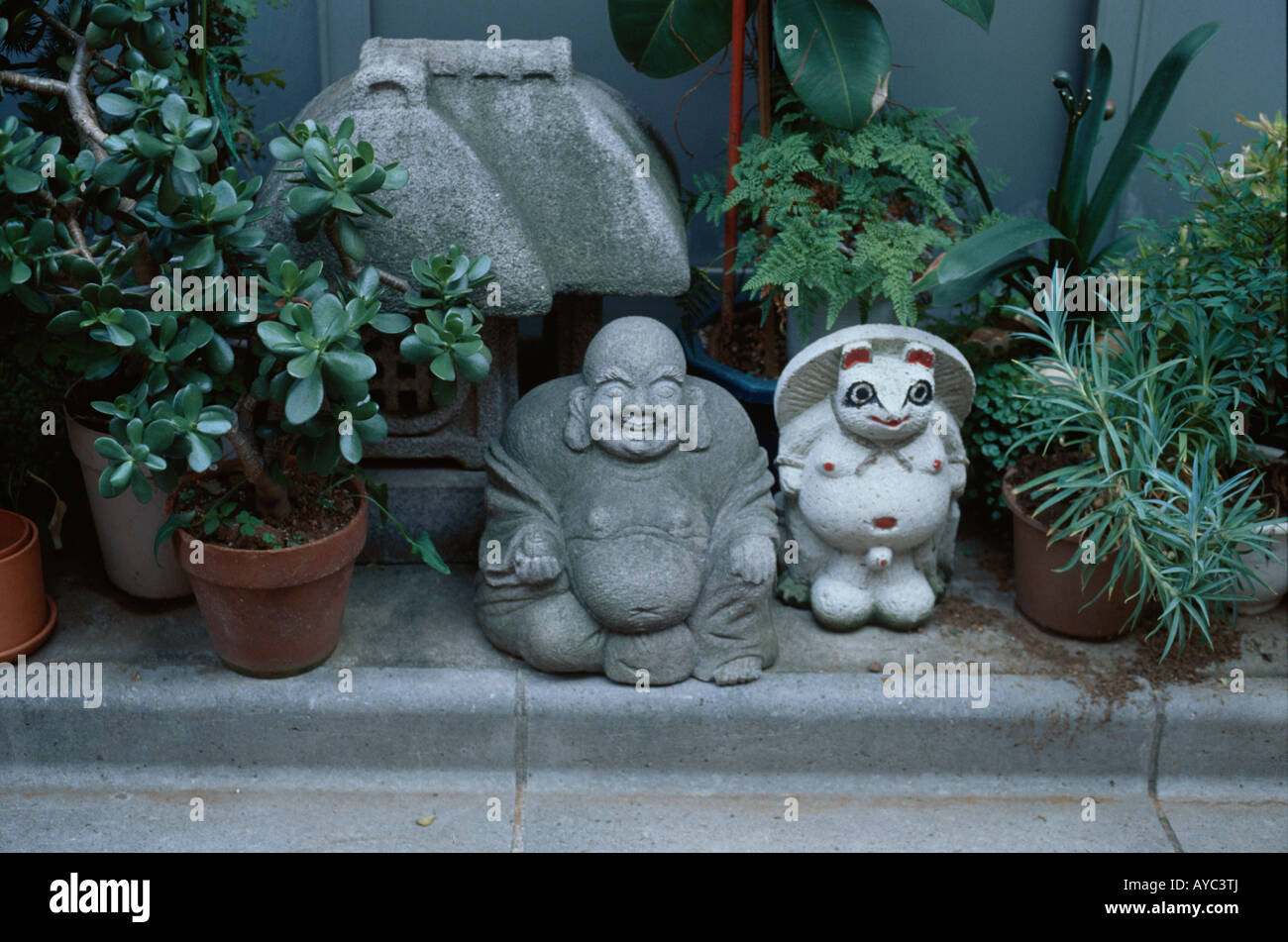 Japanese Stone Statues Stock Photo - Alamy