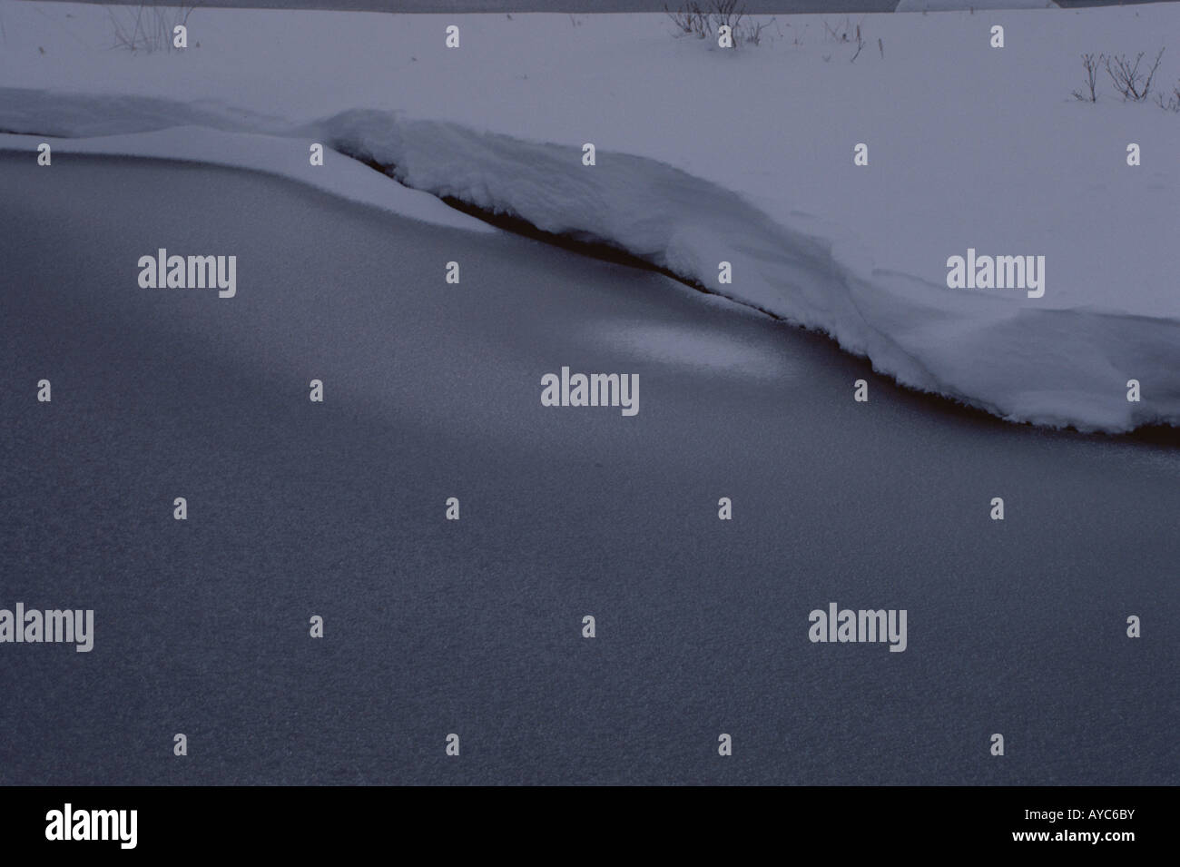 Snow on Frozen Water Surface Stock Photo - Alamy