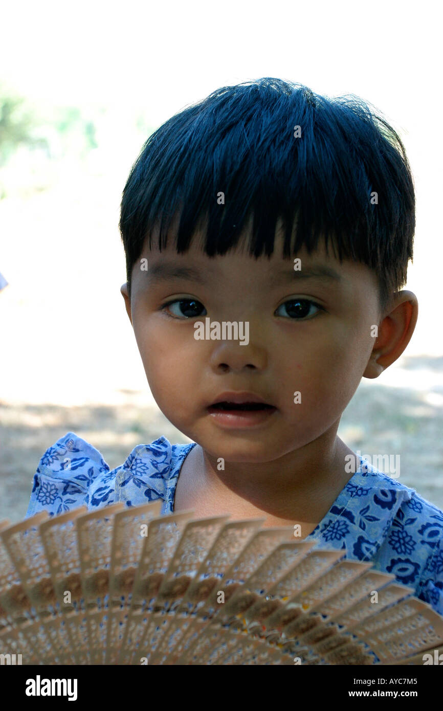 Burmese girl selling bamboo fans at Mingun, near Mandalay, Burma ...