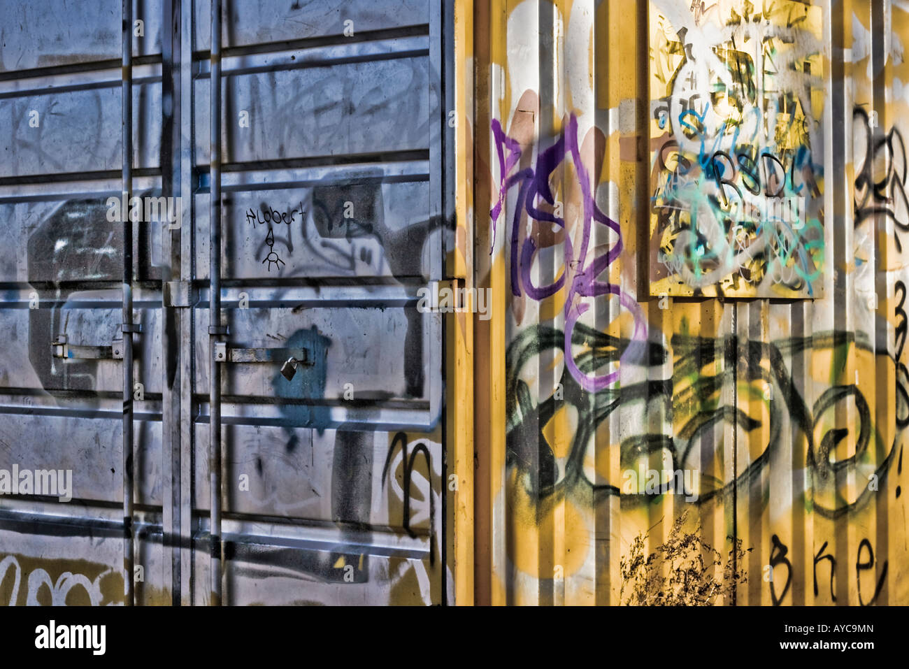 Colorful graffiti sprayed onto an old 20ft cargo container Stock Photo ...