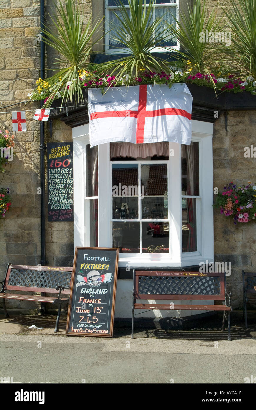 st george flag flying out side an english village pub public house ...