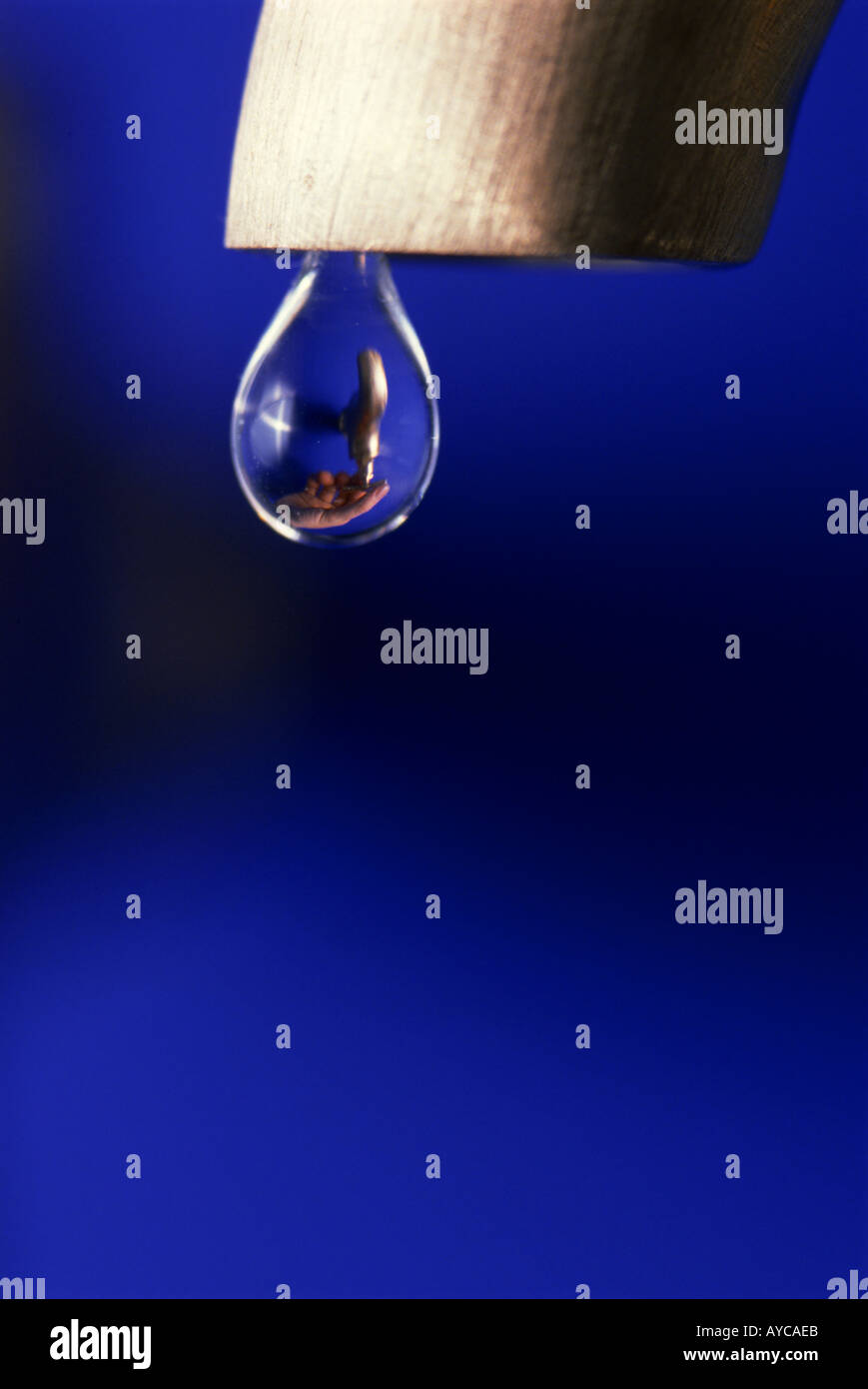 Drop of water and tap faucet Stock Photo - Alamy
