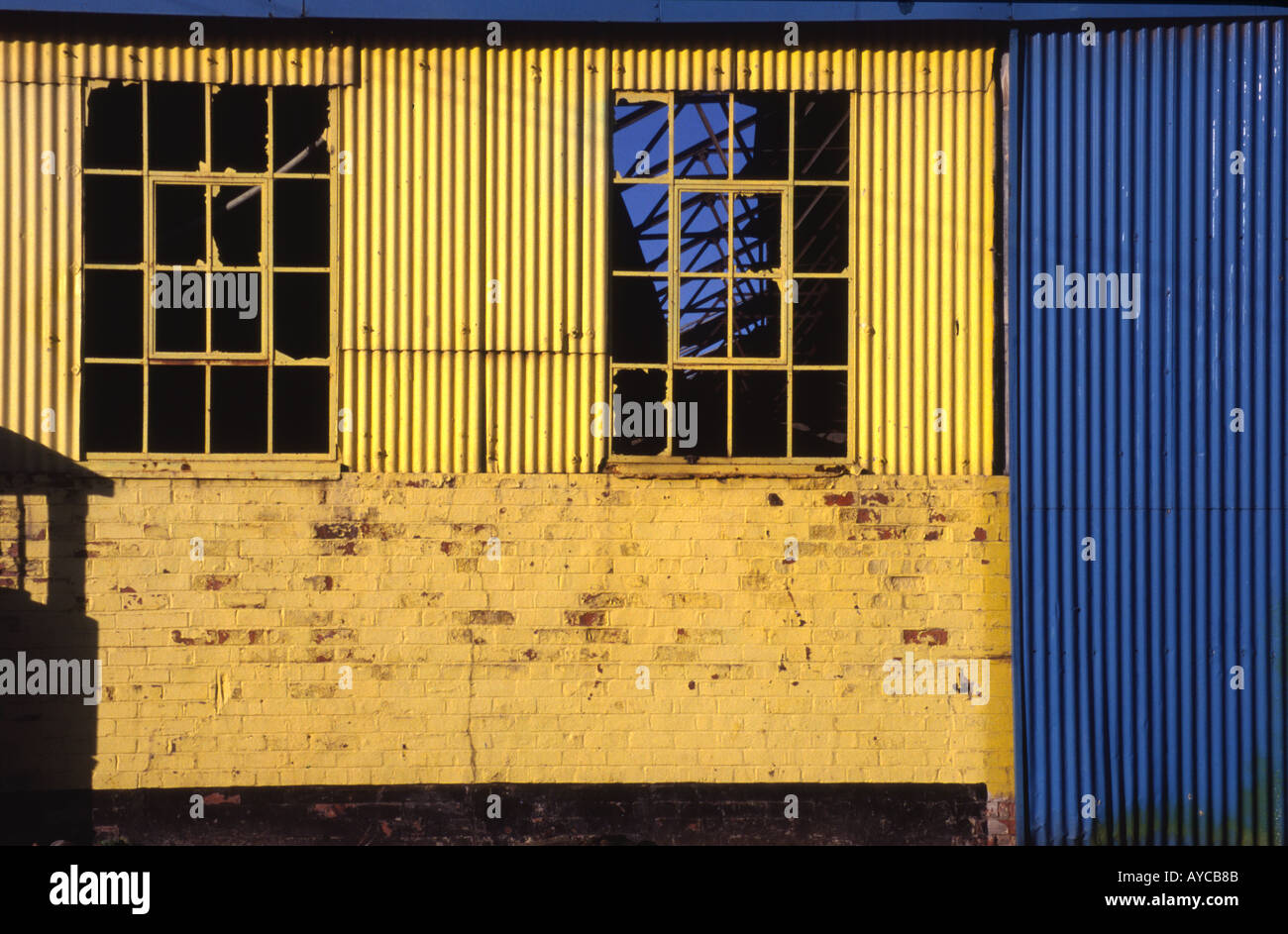Derilict yellow factory building North East England Stock Photo - Alamy