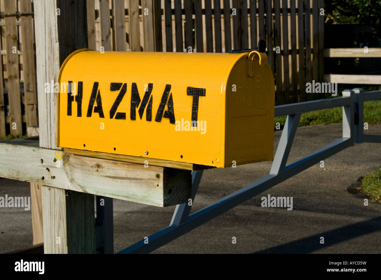 Yellow hazardous materials mailbox outside a power station Stock Photo ...