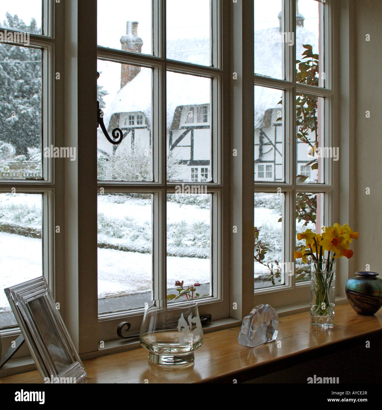 Winter snow scene through window hi-res stock photography and images ...