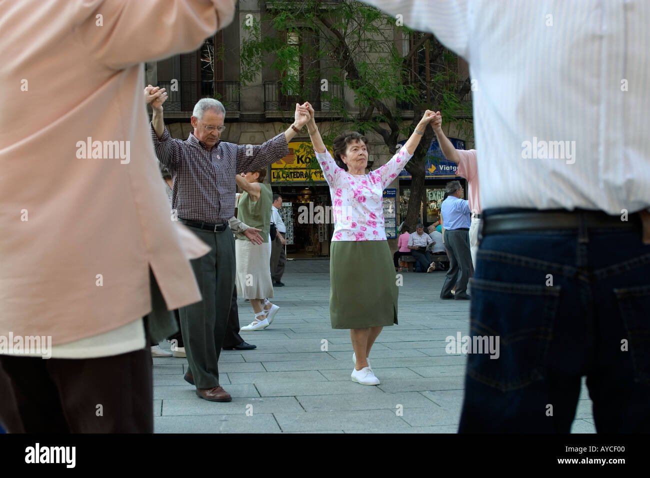 People dancing sardana traditional dance hi-res stock photography and ...