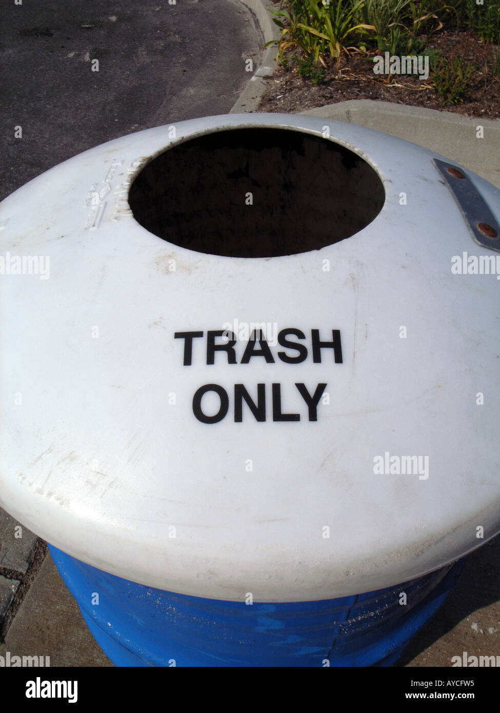 trash can with trash only sign Stock Photo - Alamy