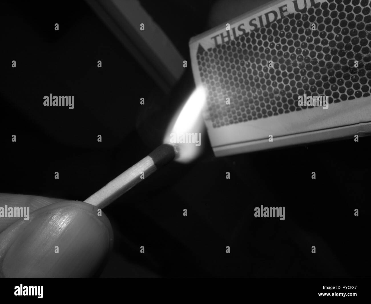 Person holding burning match hi-res stock photography and images - Alamy