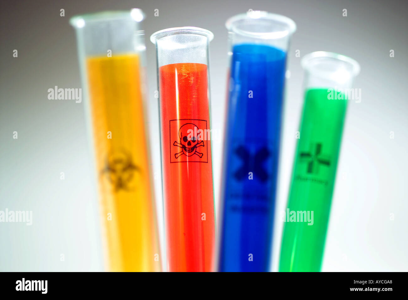 Test Tubes with warning signs for chemical waste, close up Stock Photo ...