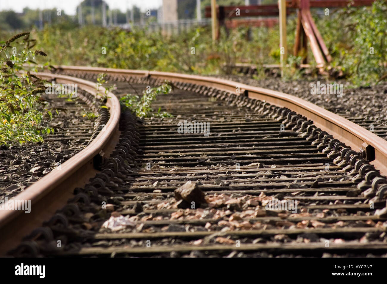 Closeup of an old rusty railway track along the riverside in Dundee, UK ...