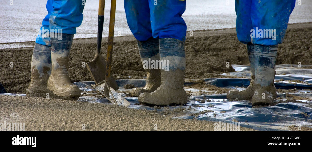 Construction workers lay foundation hi-res stock photography and images ...