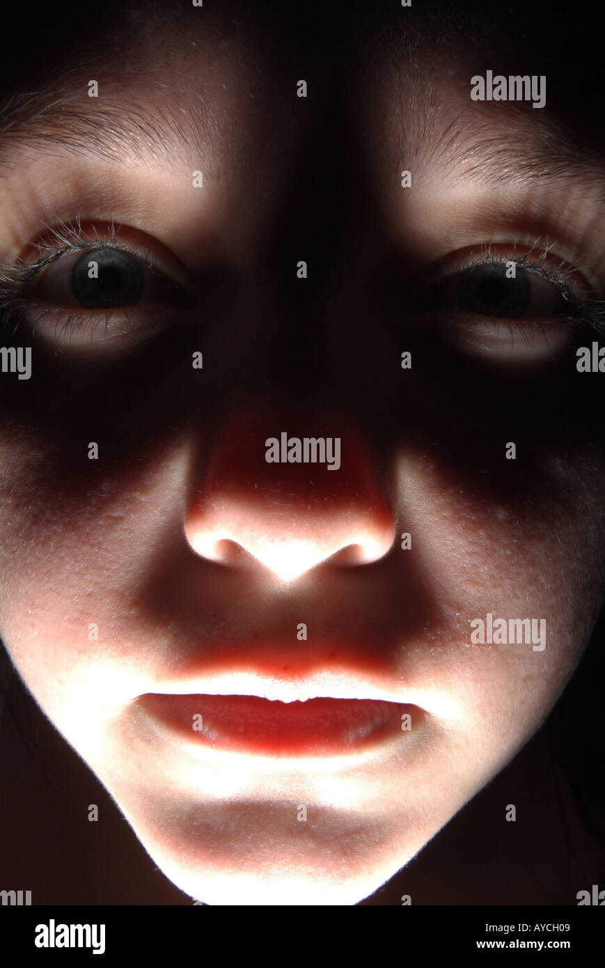 close up of a girl face with effect lighting and shadow Stock Photo - Alamy