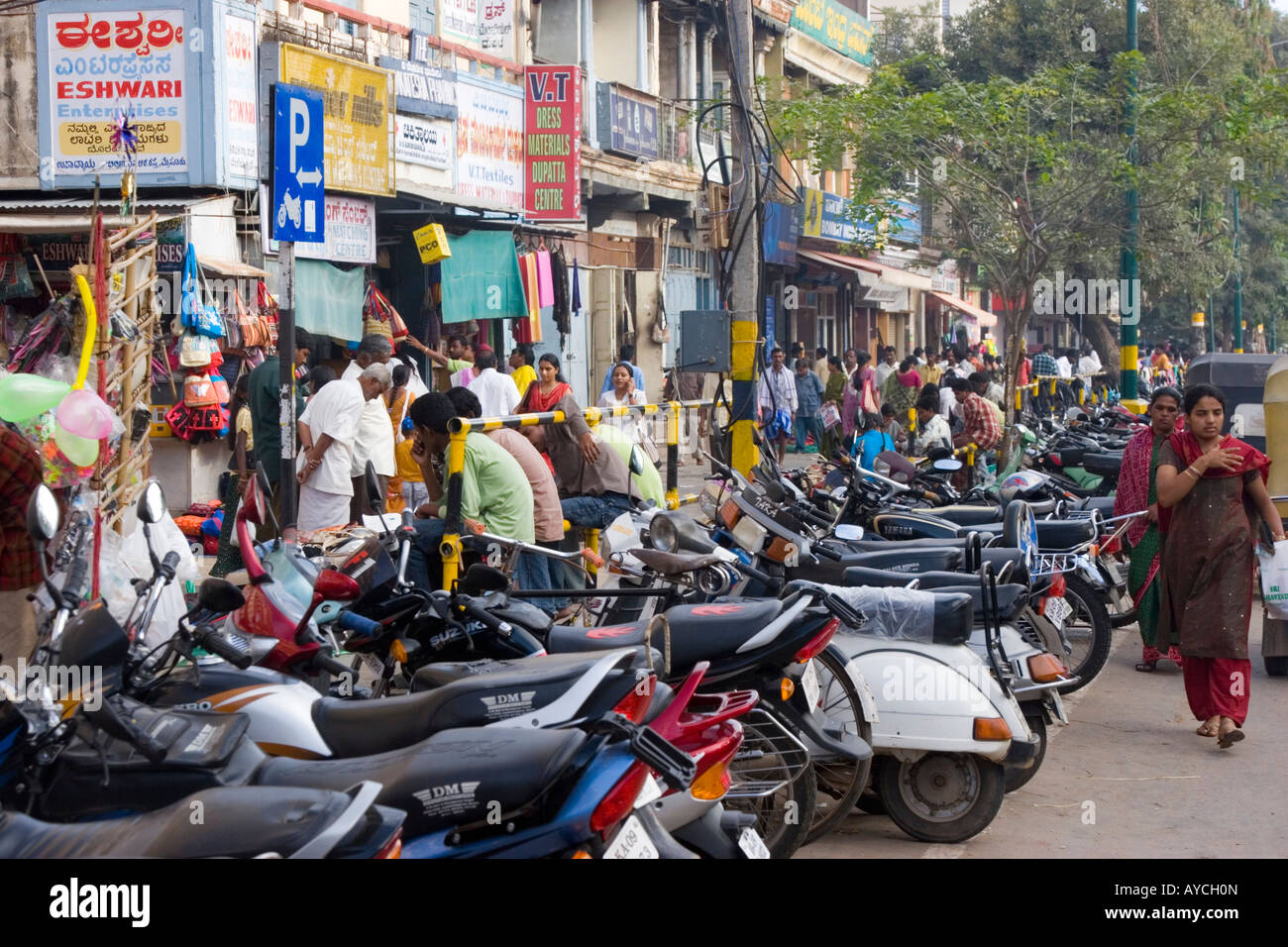 Shops and crowded street scene in Mysore India Stock Photo - Alamy
