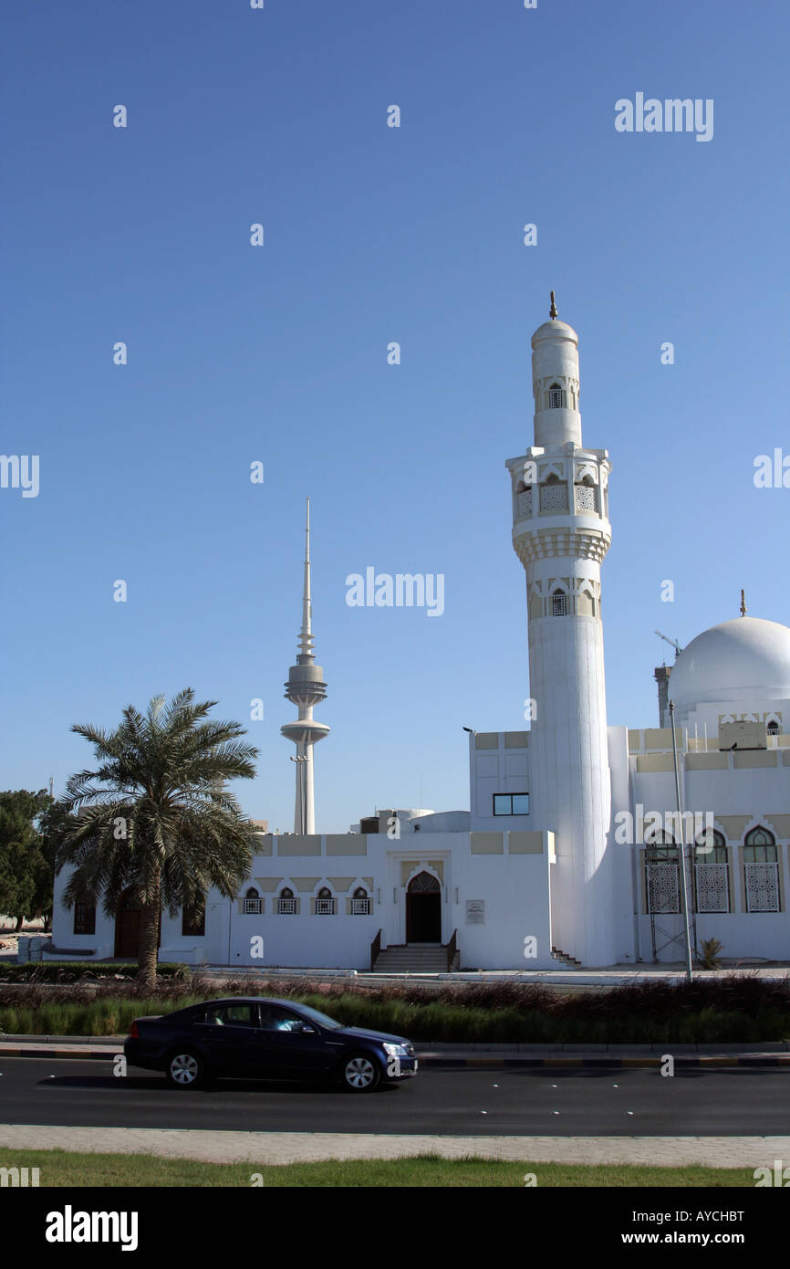 kuwait minaret dome mosque street car tower day palm tree Stock Photo ...