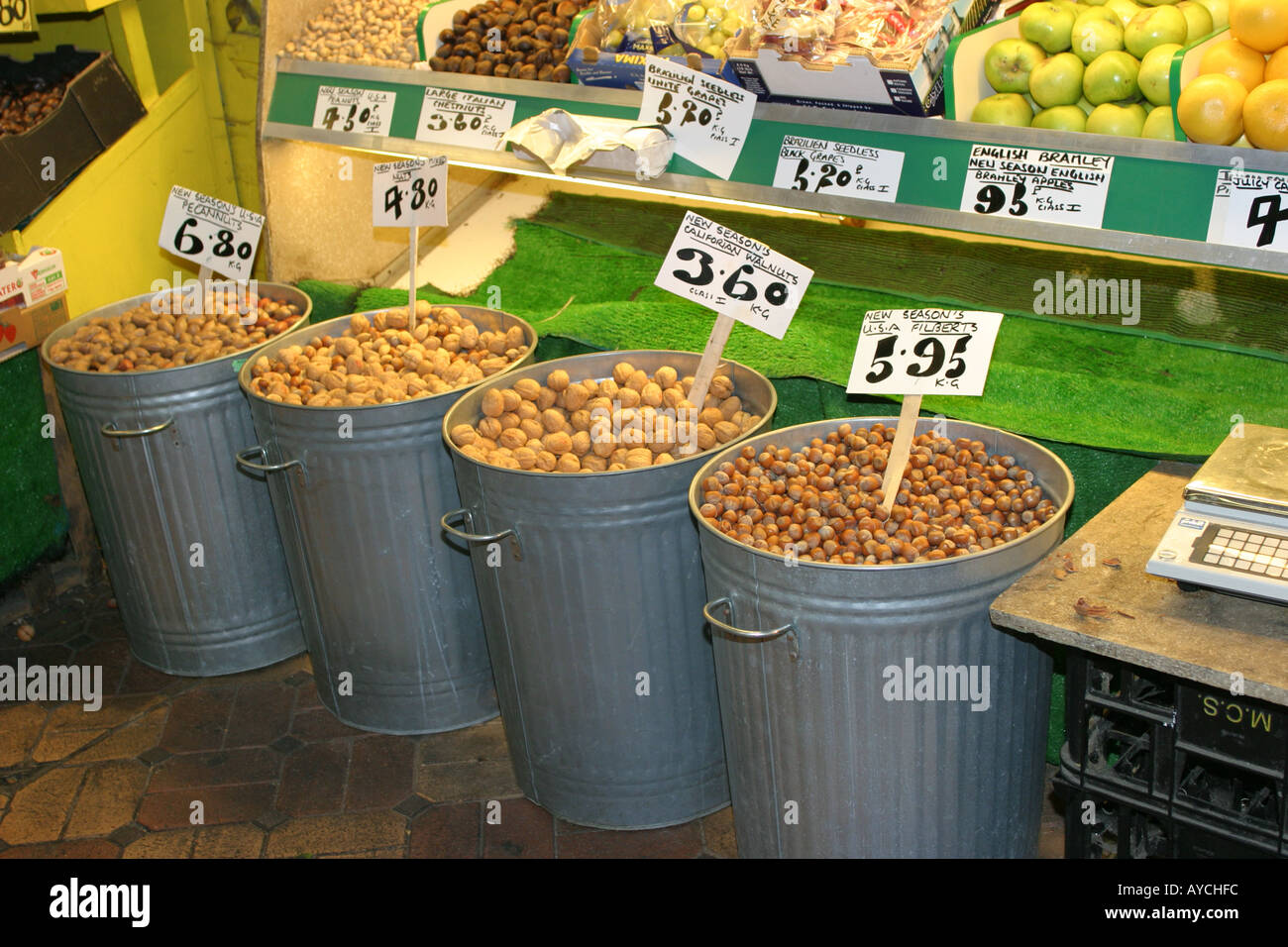 A market stall selling fresh fruit and nuts Stock Photo - Alamy