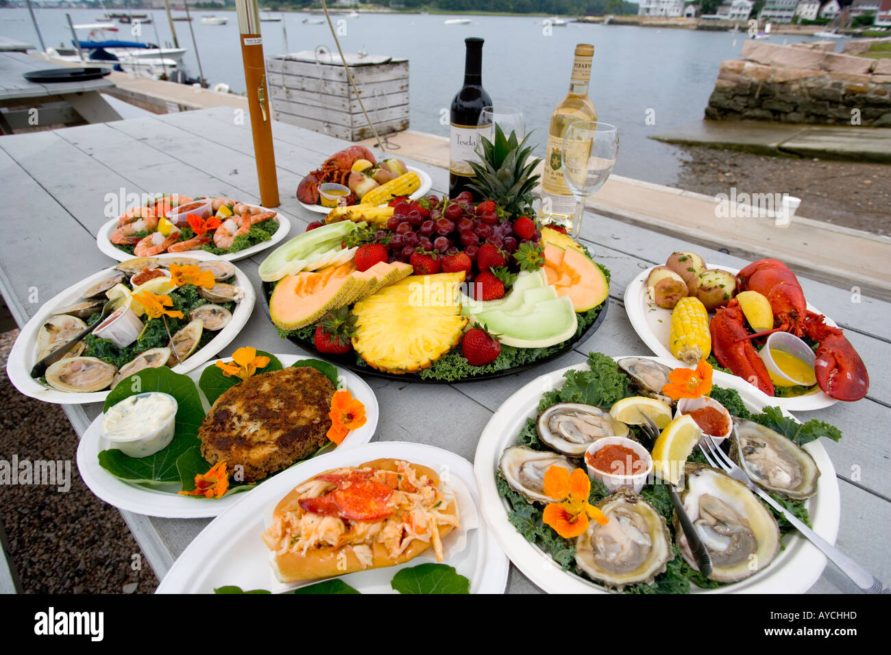 Feast of seafood and traditional new england clambake picnic foods ...