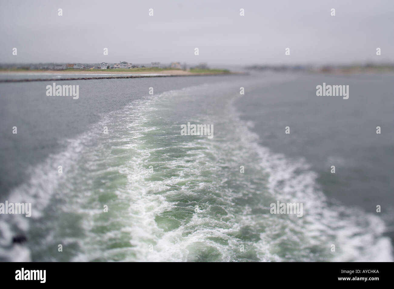 Wave behind a large ferry boat Stock Photo - Alamy