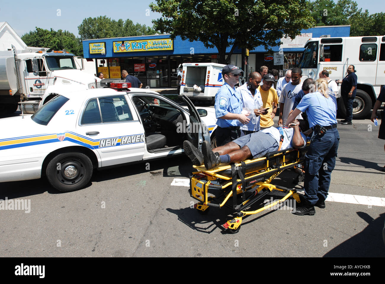 Photo of a Mail man being brought to the hospital after a car crash ...