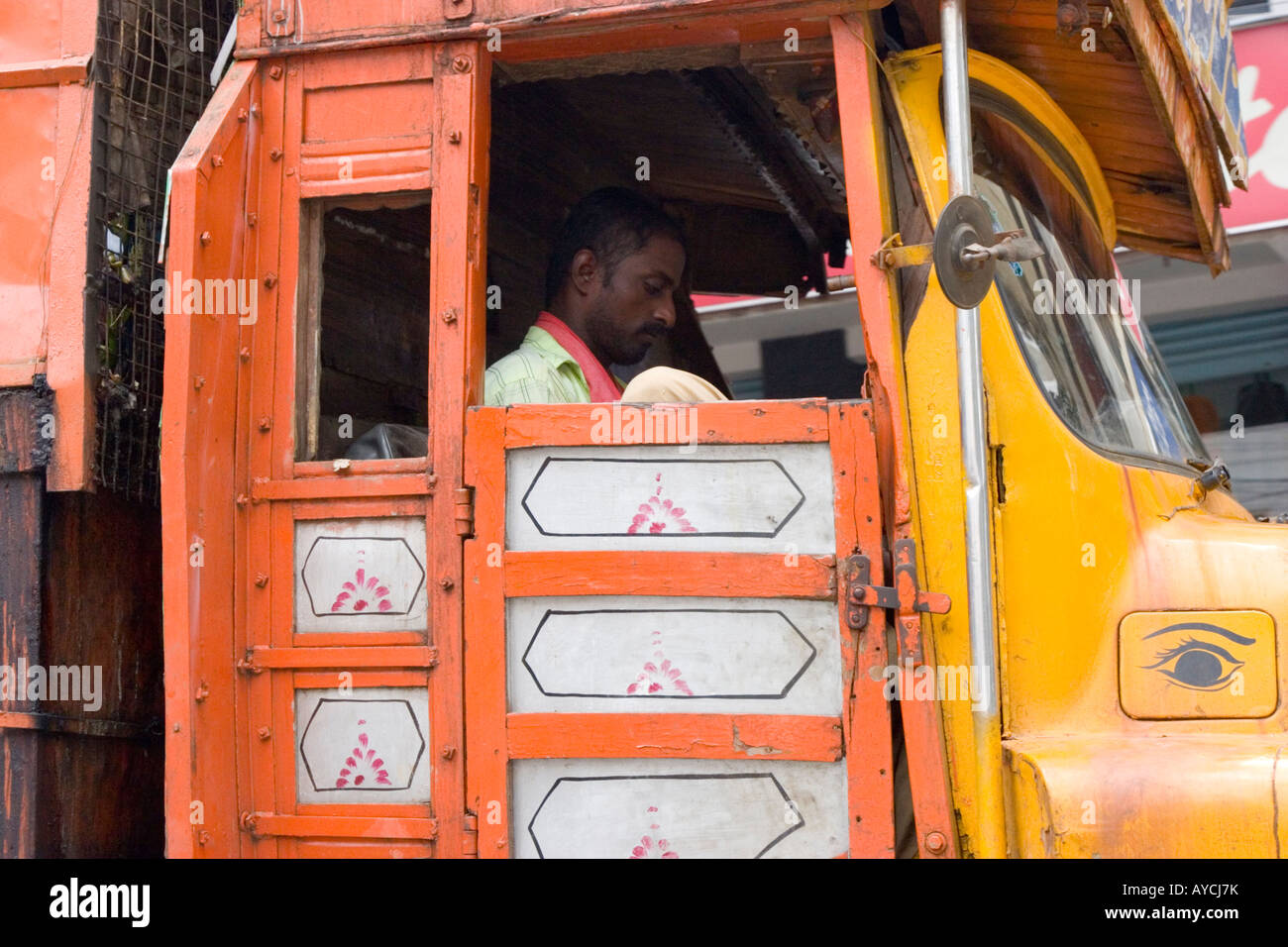 Indian lorry driver in his cab Stock Photo - Alamy