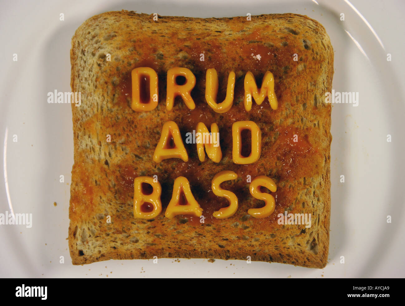 toast with words drum and bass written with alphabetti spaghetti pasta ...