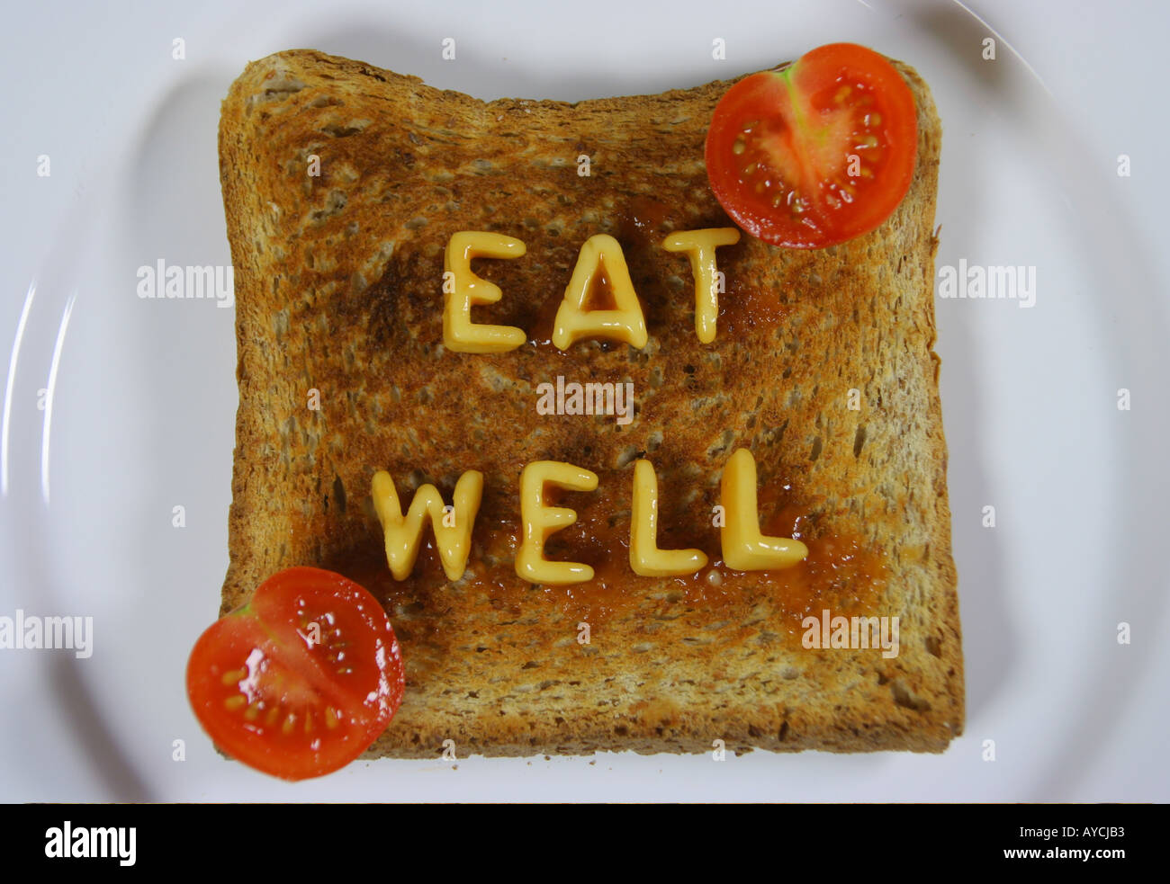 toast with words eat well written with alphabetti spaghetti pasta ...