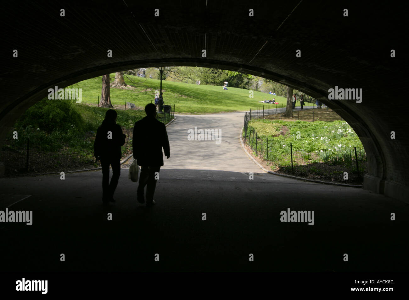 Two people walking in central park, New York City Stock Photo - Alamy