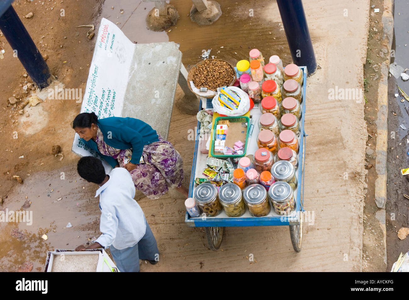 Indian woman selling peanuts hi-res stock photography and images - Alamy